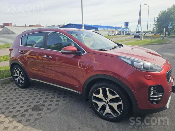 Red Kia Sportage 2016 in Riga, with an engine capacity of 1.60 L and mileage of 173 thousand km for 13900 €, photo 2 on AUTOMOTO.COM.LV
