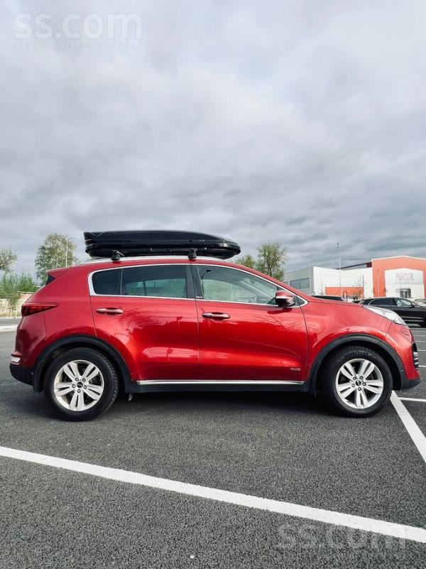 Red Kia Sportage 2016 in Jelgava, with an engine capacity of 2.00 L and mileage of 227 thousand km for 13800 €, photo 6 on AUTOMOTO.COM.LV
