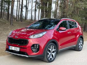 Red Kia Sportage 2016 in Riga, with an engine capacity of 2.00 L and mileage of 235 thousand km for 10900 €, photo  on AUTOMOTO.COM.LV