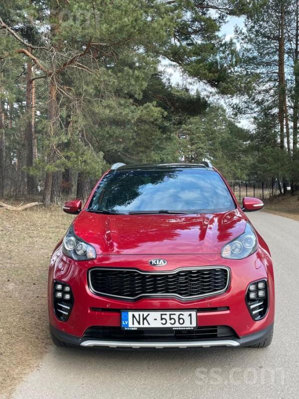 Red Kia Sportage 2016 in Riga, with an engine capacity of 2.00 L and mileage of 245 thousand km for 8600 €, photo 4 on AUTOMOTO.COM.LV