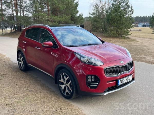 Red Kia Sportage 2016 in Riga, with an engine capacity of 2.00 L and mileage of 245 thousand km for 8600 €, photo 5 on AUTOMOTO.COM.LV