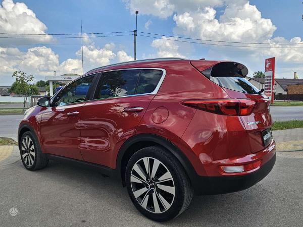 Red Kia Sportage 2016 in Siauliai, with an engine capacity of 1.69 L and mileage of 249 thousand km for 10750 €, photo 7 on AUTOMOTO.COM.LV