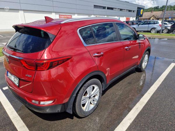 Red Kia Sportage 2016 in Kaunas, with an engine capacity of 1.69 L and mileage of 231 thousand km for 10527 €, photo 3 on AUTOMOTO.COM.LV