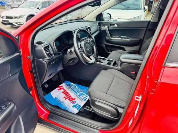 Red Kia Sportage 2016 in Kaunas, with an engine capacity of 1.60 L and mileage of 106 thousand km for 13200 €, photo 8 on AUTOMOTO.COM.LV
