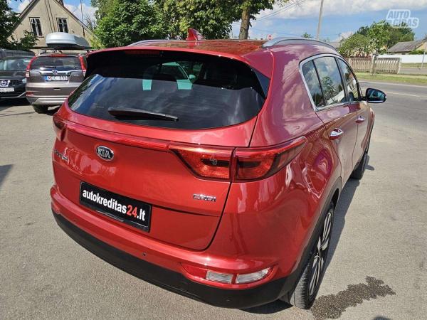 Red Kia Sportage 2016 in Siauliai, with an engine capacity of 1.70 L and mileage of 249 thousand km for 10750 €, photo 6 on AUTOMOTO.COM.LV