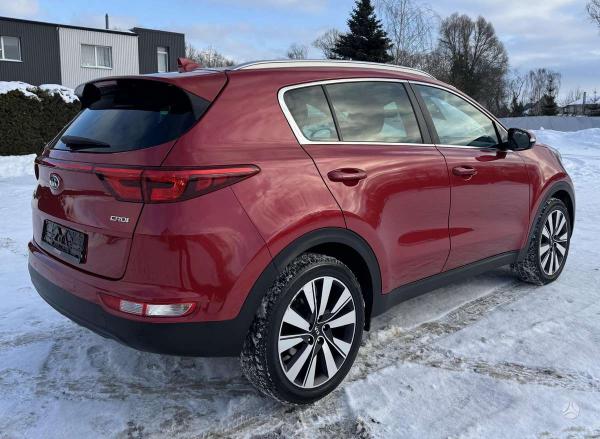 Red Kia Sportage 2017 in Panevezys, with an engine capacity of 1.69 L and mileage of 209 thousand km for 10300 €, photo 4 on AUTOMOTO.COM.LV