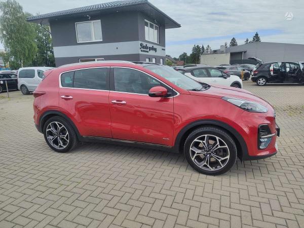 Red Kia Sportage 2018 in Taurage, with an engine capacity of 1.59 L and mileage of 174 thousand km for 13800 €, photo 5 on AUTOMOTO.COM.LV