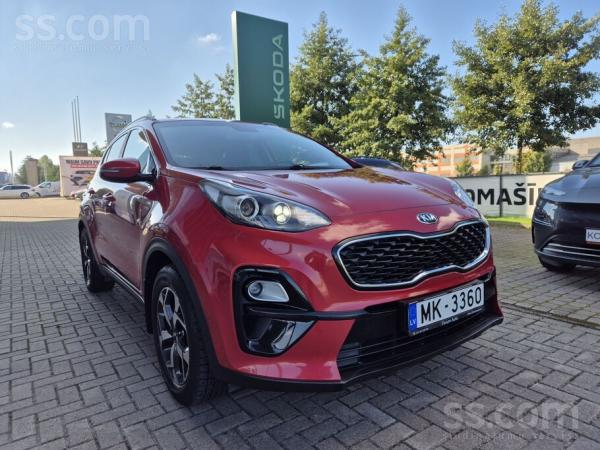 Red Kia Sportage 2020 in Liepaja, with an engine capacity of 1.60 L and mileage of 81 thousand km for 15850 €, photo 1 on AUTOMOTO.COM.LV