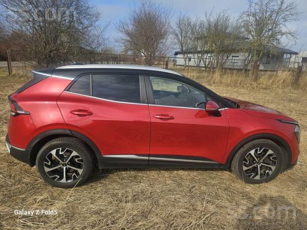 Red Kia Sportage 2022 in Riga, with an engine capacity of 1.60 L and mileage of 72 thousand km for 22500 €, photo 3 on AUTOMOTO.COM.LV
