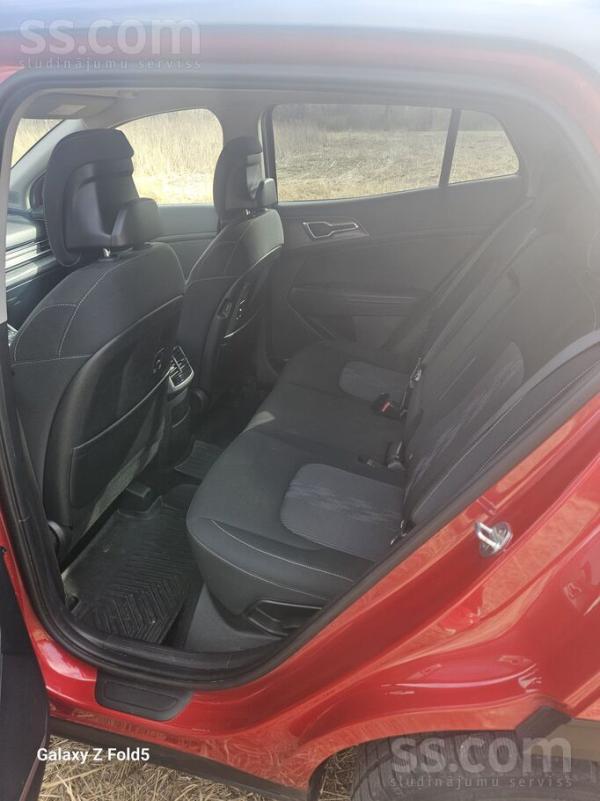 Red Kia Sportage 2022 in Riga, with an engine capacity of 1.60 L and mileage of 72 thousand km for 22500 €, photo 8 on AUTOMOTO.COM.LV
