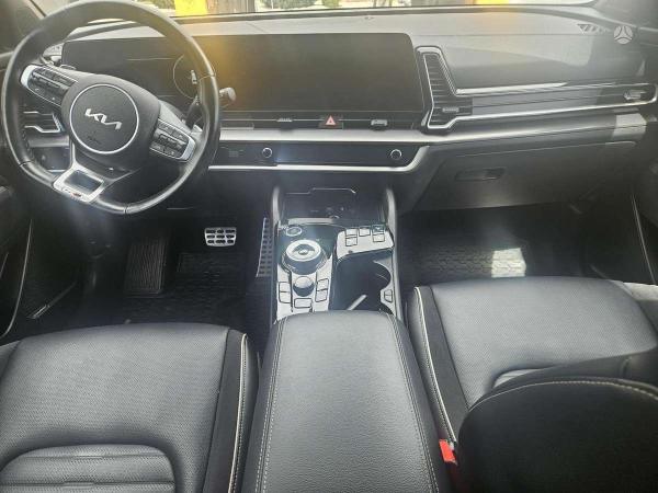 Red Kia Sportage 2022 in Kaunas, with an engine capacity of 1.60 L and mileage of 65 thousand km for 26000 €, photo 2 on AUTOMOTO.COM.LV