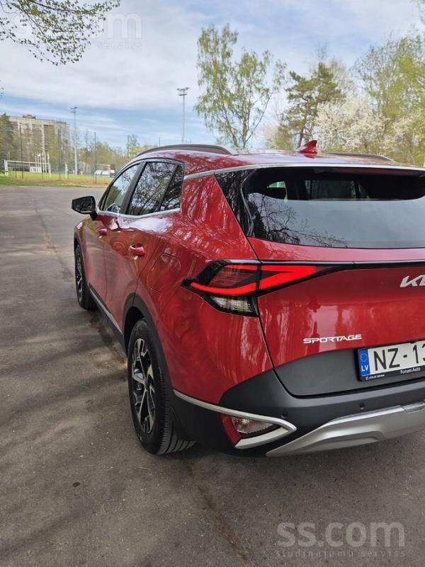 Red Kia Sportage 2024 in Jurmala, with an engine capacity of 1.60 L and mileage of 32 thousand km for 26000 €, photo 4 on AUTOMOTO.COM.LV