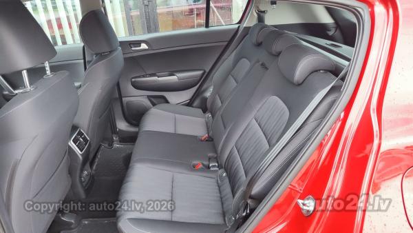 Red Kia Sportage 2021 in Tartu, with an engine capacity of 1.60 L and mileage of 78 thousand km for 16990 €, photo 6 on AUTOMOTO.COM.LV