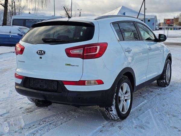 Белый Киа Sportage 2011 в Рокишкис, объемом двигателя 1.69 л и пробегом 220 тыс. км за 5350 €, фото 7 на AUTOMOTO.COM.LV