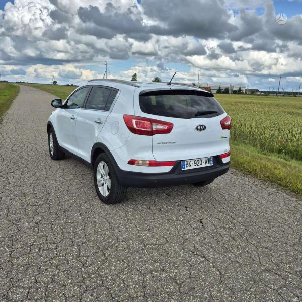 White Kia Sportage 2011 in Radviliskis, with an engine capacity of 1.69 L and mileage of 238 thousand km for 6500 €, photo 8 on AUTOMOTO.COM.LV