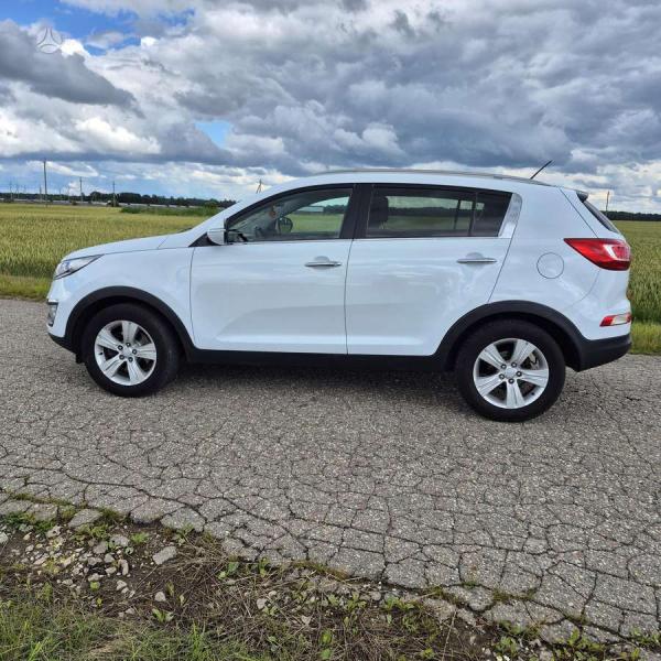 White Kia Sportage 2011 in Radviliskis, with an engine capacity of 1.69 L and mileage of 238 thousand km for 6500 €, photo 10 on AUTOMOTO.COM.LV
