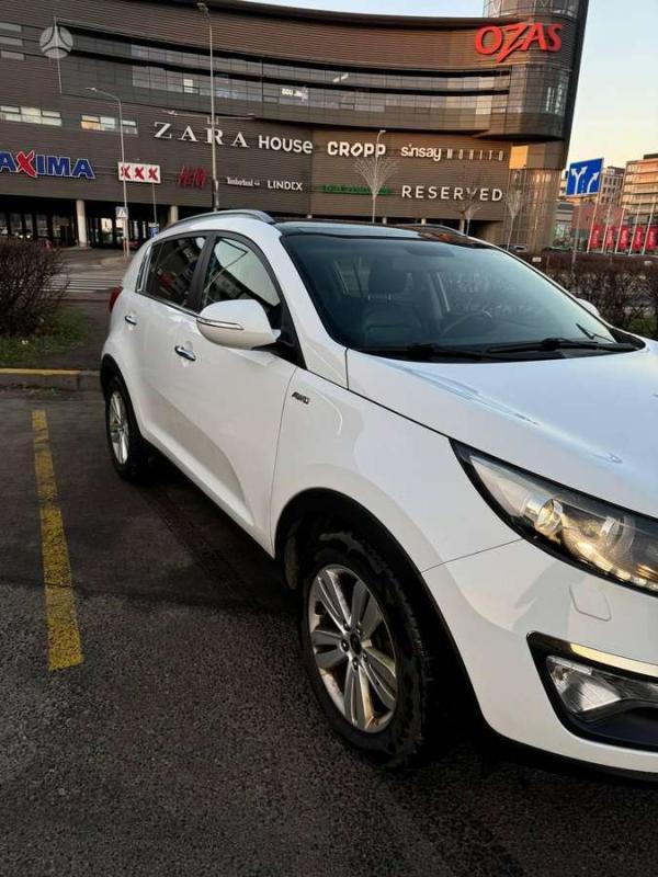 Kia Sportage 2011 Viļņa vietnē Balts Kia Sportage 2011 Viļņa, ar dzinēja tilpumu 2.00 L un nobraukumu 301 tūkst. km par 4900 €, foto 3 vietnē AUTOMOTO.COM.LV