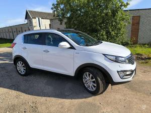 White Kia Sportage 2012 in Kaunas, with an engine capacity of 2.00 L and mileage of 221 thousand km for 7200 €, photo  on AUTOMOTO.COM.LV