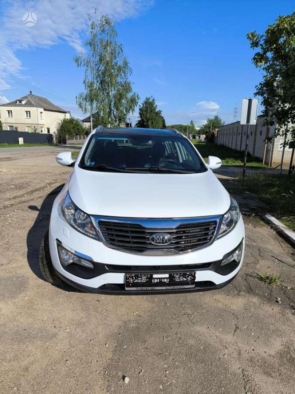 White Kia Sportage 2012 in Kaunas, with an engine capacity of 2.00 L and mileage of 221 thousand km for 7200 €, photo 2 on AUTOMOTO.COM.LV