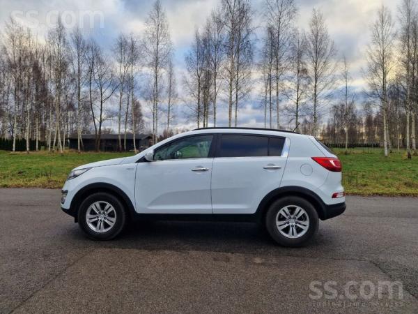 Белый Киа Sportage 2013 в Рига, объемом двигателя 2.00 л и пробегом 220 тыс. км за 6850 €, фото 5 на AUTOMOTO.COM.LV