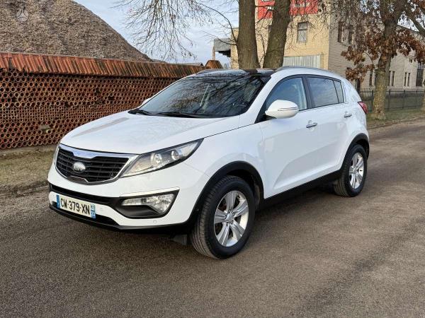 White Kia Sportage 2013 in Taurage, with an engine capacity of 1.69 L and mileage of 212 thousand km for 6300 €, photo 1 on AUTOMOTO.COM.LV