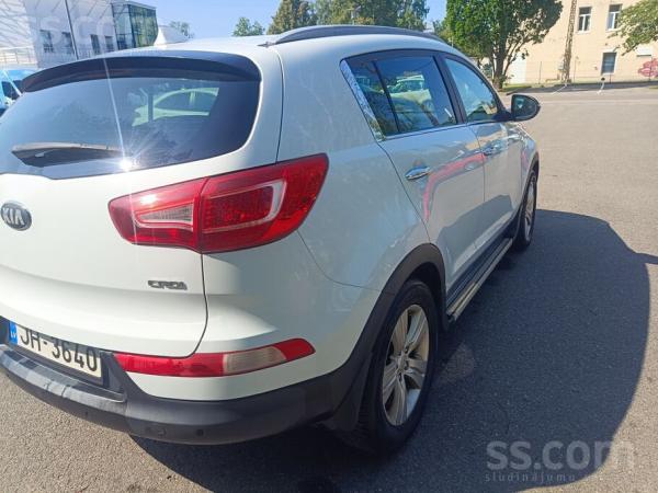 Balts Kia Sportage 2013 Rīga, ar dzinēja tilpumu 2.00 L un nobraukumu 214 tūkst. km par 6600 €, foto 6 vietnē AUTOMOTO.COM.LV