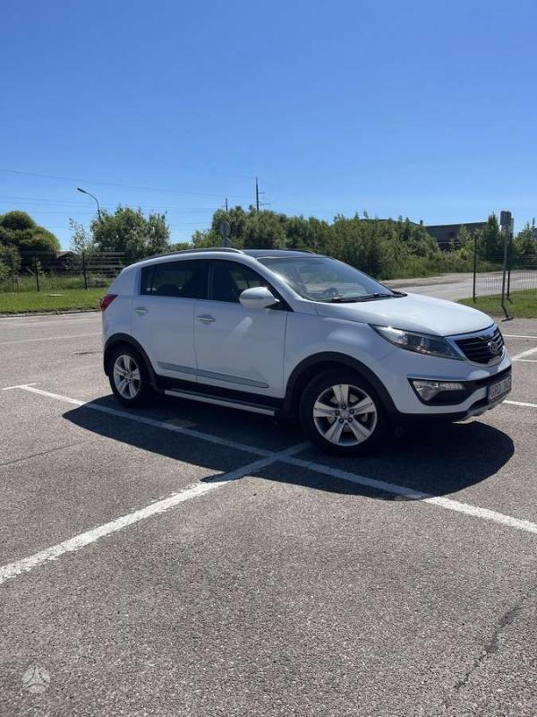 Белый Киа Sportage 2013 в Клайпеда, объемом двигателя 1.69 л и пробегом 305 тыс. км за 6450 €, фото 5 на AUTOMOTO.COM.LV