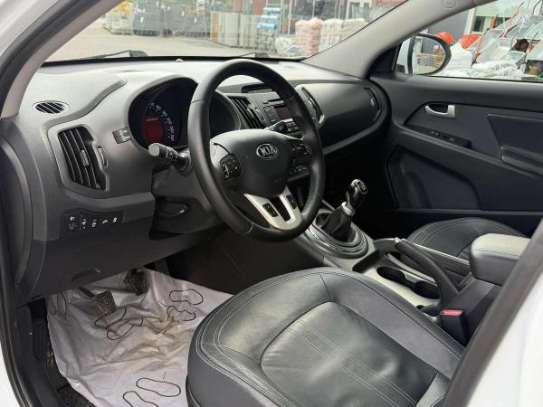 Белый Киа Sportage 2013 в Таураге, объемом двигателя 1.69 л и пробегом 233 тыс. км за 5999 €, фото 10 на AUTOMOTO.COM.LV