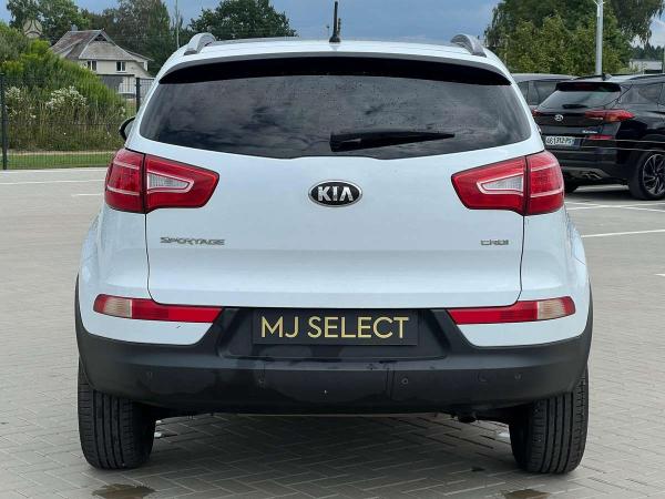 White Kia Sportage 2013 in Taurage, with an engine capacity of 1.69 L and mileage of 273 thousand km for 5600 €, photo 7 on AUTOMOTO.COM.LV