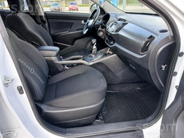 White Kia Sportage 2013 in Ogre, with an engine capacity of 1.70 L and mileage of 320 thousand km for 6200 €, photo 9 on AUTOMOTO.COM.LV