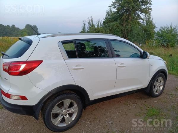 Белый Киа Sportage 2013 в Айзкраукле, объемом двигателя 1.70 л и пробегом 293 тыс. км за 5099 €, фото 4 на AUTOMOTO.COM.LV