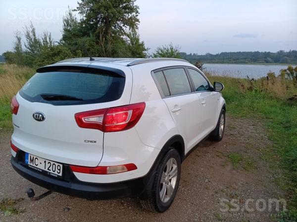 Белый Киа Sportage 2013 в Айзкраукле, объемом двигателя 1.70 л и пробегом 293 тыс. км за 5099 €, фото 5 на AUTOMOTO.COM.LV