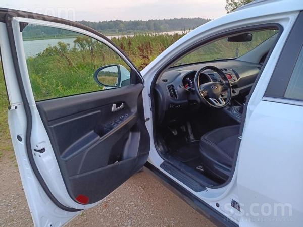 Белый Киа Sportage 2013 в Айзкраукле, объемом двигателя 1.70 л и пробегом 293 тыс. км за 5099 €, фото 6 на AUTOMOTO.COM.LV