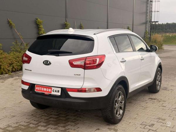 White Kia Sportage 2013 in Vilnius, with an engine capacity of 1.69 L and mileage of 144 thousand km for 8250 €, photo 7 on AUTOMOTO.COM.LV