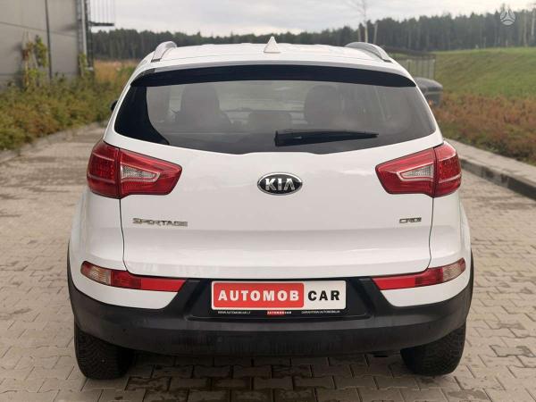White Kia Sportage 2013 in Vilnius, with an engine capacity of 1.69 L and mileage of 144 thousand km for 8250 €, photo 8 on AUTOMOTO.COM.LV