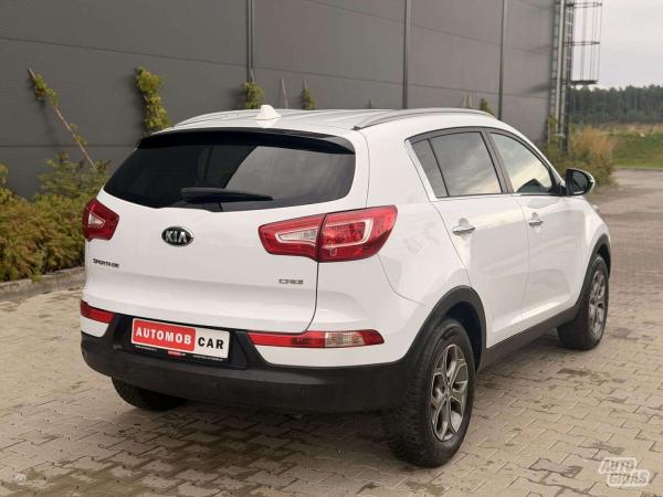 White Kia Sportage 2013 in Vilnius, with an engine capacity of 1.70 L and mileage of 144 thousand km for 8250 €, photo 7 on AUTOMOTO.COM.LV
