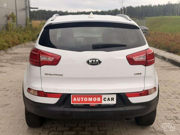 White Kia Sportage 2013 in Vilnius, with an engine capacity of 1.70 L and mileage of 144 thousand km for 8250 €, photo 8 on AUTOMOTO.COM.LV