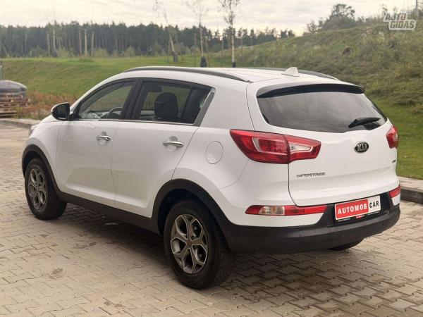 White Kia Sportage 2013 in Vilnius, with an engine capacity of 1.70 L and mileage of 144 thousand km for 8250 €, photo 10 on AUTOMOTO.COM.LV