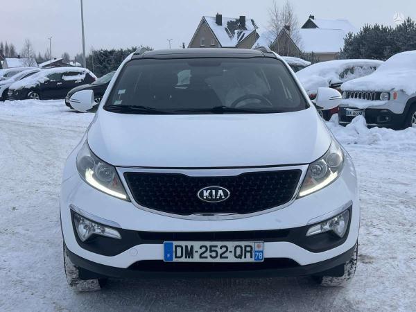 White Kia Sportage 2014 in Taurage, with an engine capacity of 1.69 L and mileage of 220 thousand km for 7300 €, photo 4 on AUTOMOTO.COM.LV