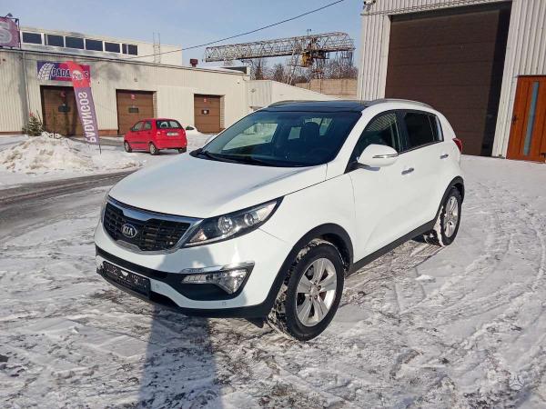 White Kia Sportage 2014 in Alytus, with an engine capacity of 1.69 L and mileage of 240 thousand km for 6700 €, photo 5 on AUTOMOTO.COM.LV