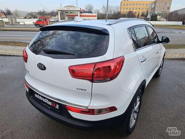 White Kia Sportage 2014 in Siauliai, with an engine capacity of 1.70 L and mileage of 197 thousand km for 7950 €, photo 8 on AUTOMOTO.COM.LV