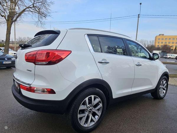 White Kia Sportage 2014 in Siauliai, with an engine capacity of 1.70 L and mileage of 197 thousand km for 7950 €, photo 9 on AUTOMOTO.COM.LV