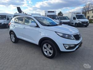 Balts Kia Sportage 2014 Tauragė, ar dzinēja tilpumu 1.70 L un nobraukumu 230 tūkst. km par 6599 €, foto  vietnē AUTOMOTO.COM.LV