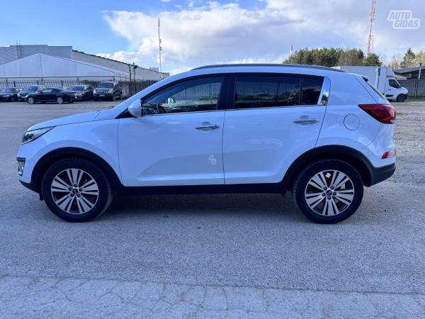 White Kia Sportage 2014 in Vilnius, with an engine capacity of 1.70 L and mileage of 177 thousand km for 9650 €, photo 9 on AUTOMOTO.COM.LV