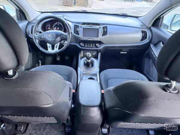 White Kia Sportage 2014 in Vilnius, with an engine capacity of 1.70 L and mileage of 177 thousand km for 9650 €, photo 10 on AUTOMOTO.COM.LV