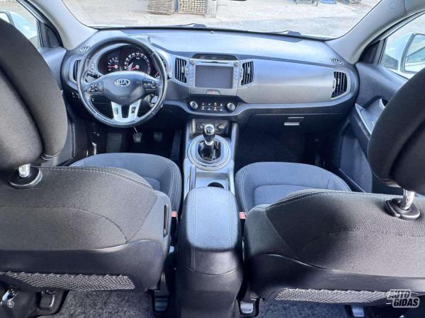 White Kia Sportage 2014 in Vilnius, with an engine capacity of 1.70 L and mileage of 177 thousand km for 9650 €, photo 8 on AUTOMOTO.COM.LV