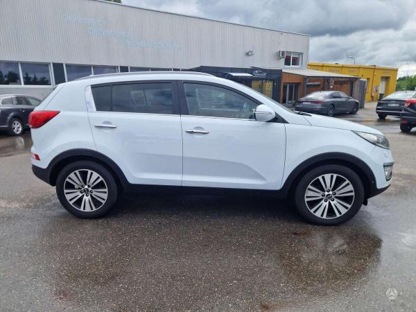 Белый Киа Sportage 2014 в Укмерге, объемом двигателя 1.69 л и пробегом 230 тыс. км за 6250 €, фото 5 на AUTOMOTO.COM.LV