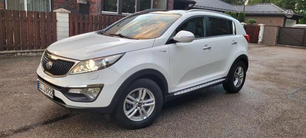 White Kia Sportage 2014 in Marijampole, with an engine capacity of 2.00 L and mileage of 186 thousand km for 9200 €, photo 1 on AUTOMOTO.COM.LV