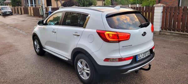 White Kia Sportage 2014 in Marijampole, with an engine capacity of 2.00 L and mileage of 186 thousand km for 9200 €, photo 2 on AUTOMOTO.COM.LV