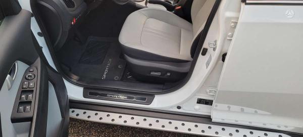 White Kia Sportage 2014 in Marijampole, with an engine capacity of 2.00 L and mileage of 186 thousand km for 9200 €, photo 8 on AUTOMOTO.COM.LV